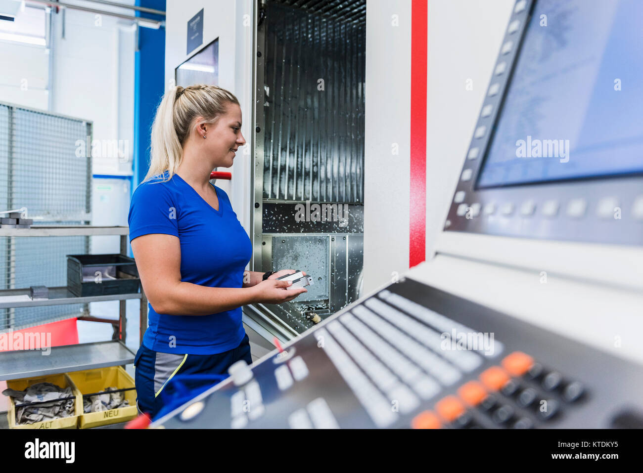 Women in industrial production hi-res stock photography and images - Alamy