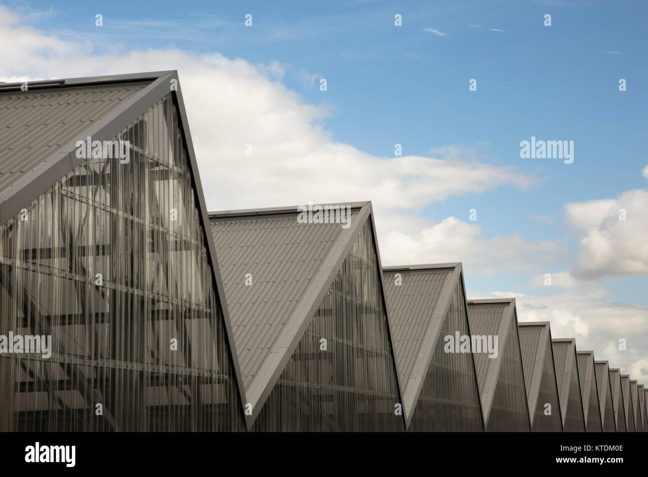 Row of grey gable roofs Stock Photo - Alamy