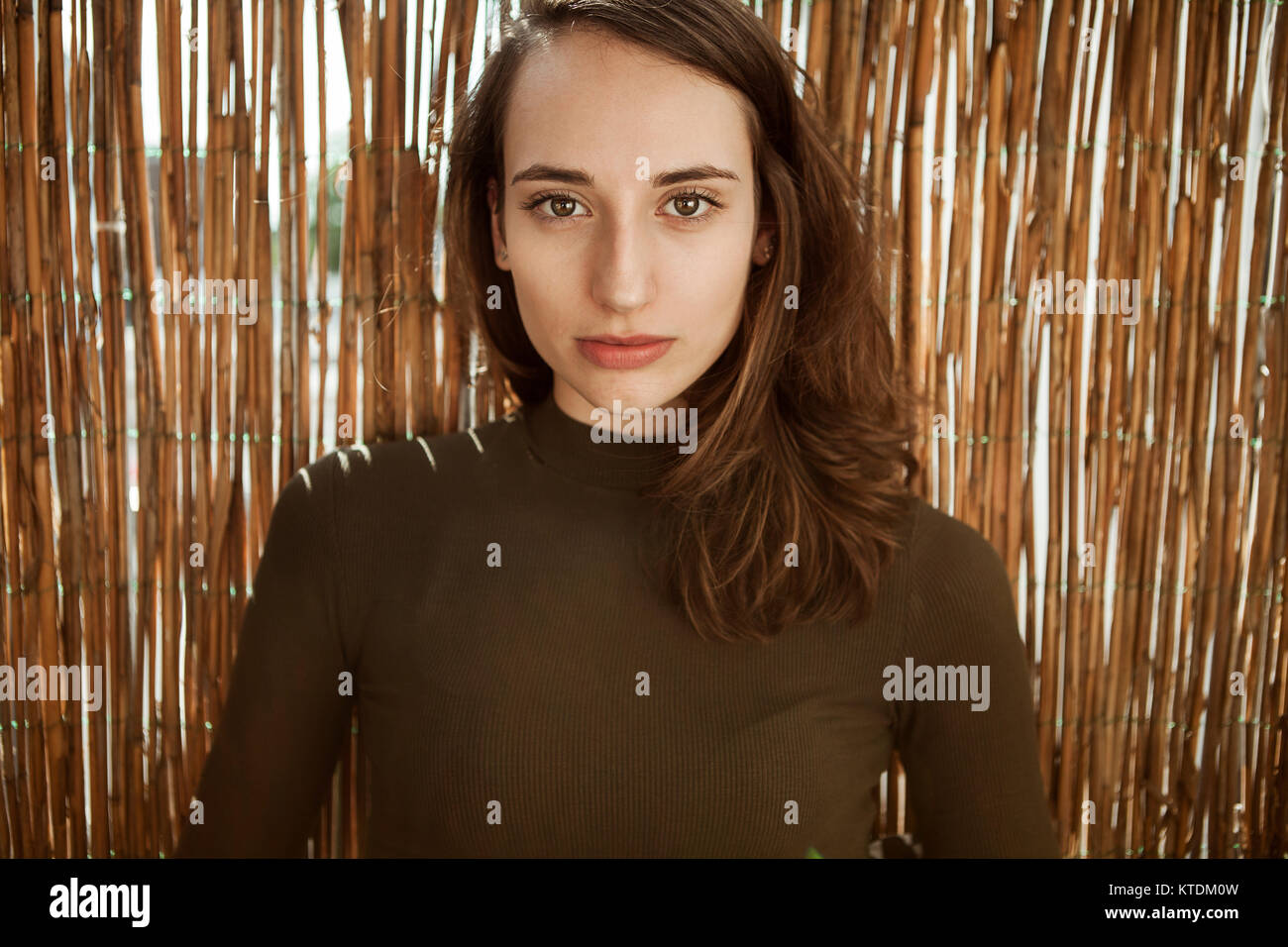 Portrait of serious young woman Stock Photo - Alamy