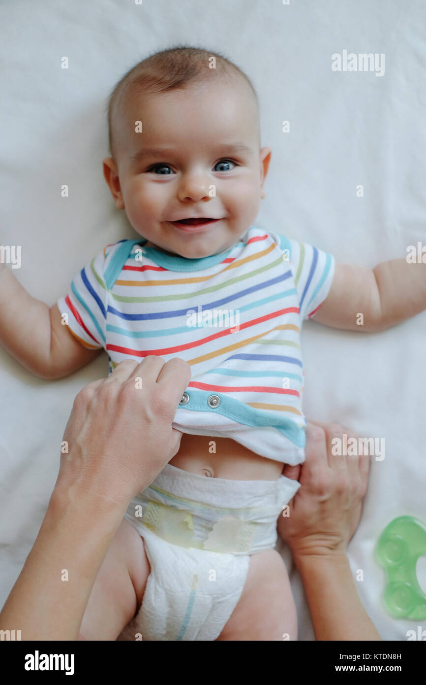 Boy getting dressed hi-res stock photography and images - Alamy