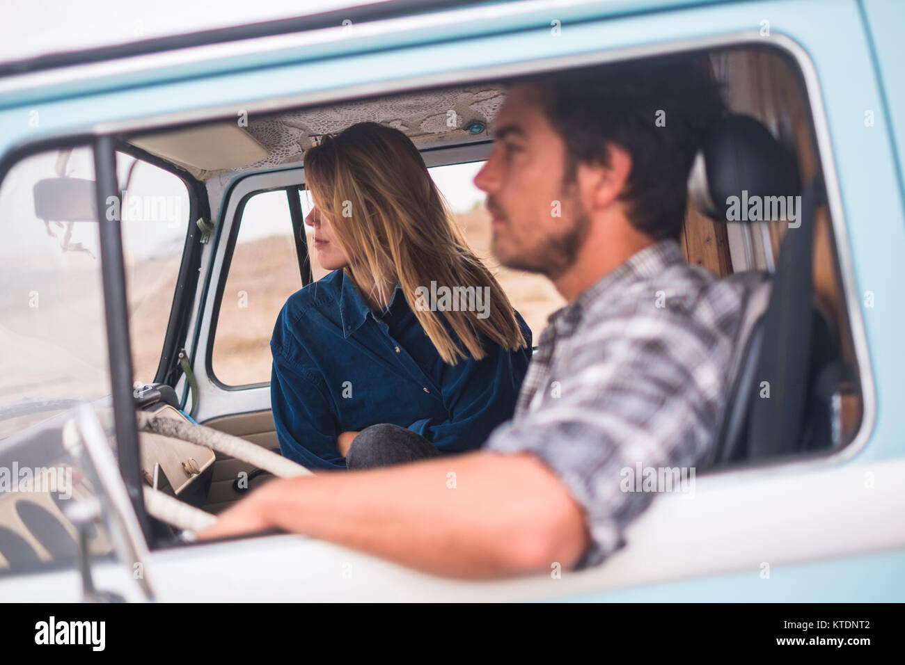 Young couple inside a van Stock Photo - Alamy