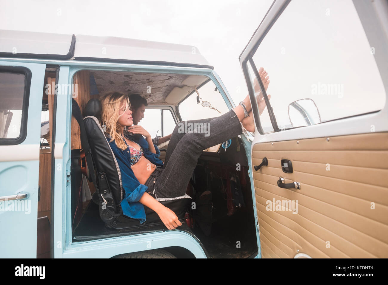 Young couple leaning their camper hi-res stock photography and images ...