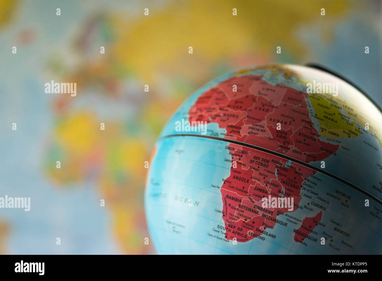 Africa map on a globe with earth map in the background Stock Photo - Alamy