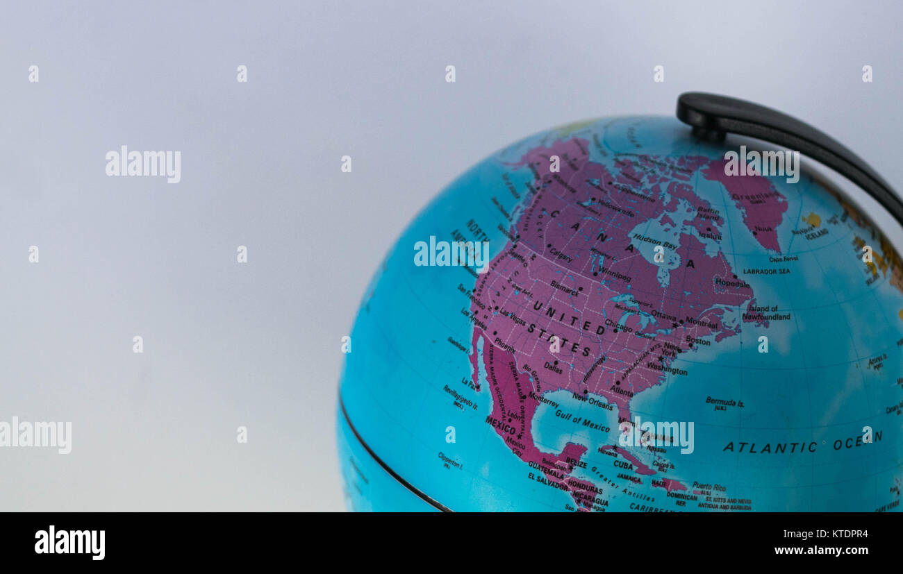 America and Canada map on a globe with white background Stock Photo - Alamy