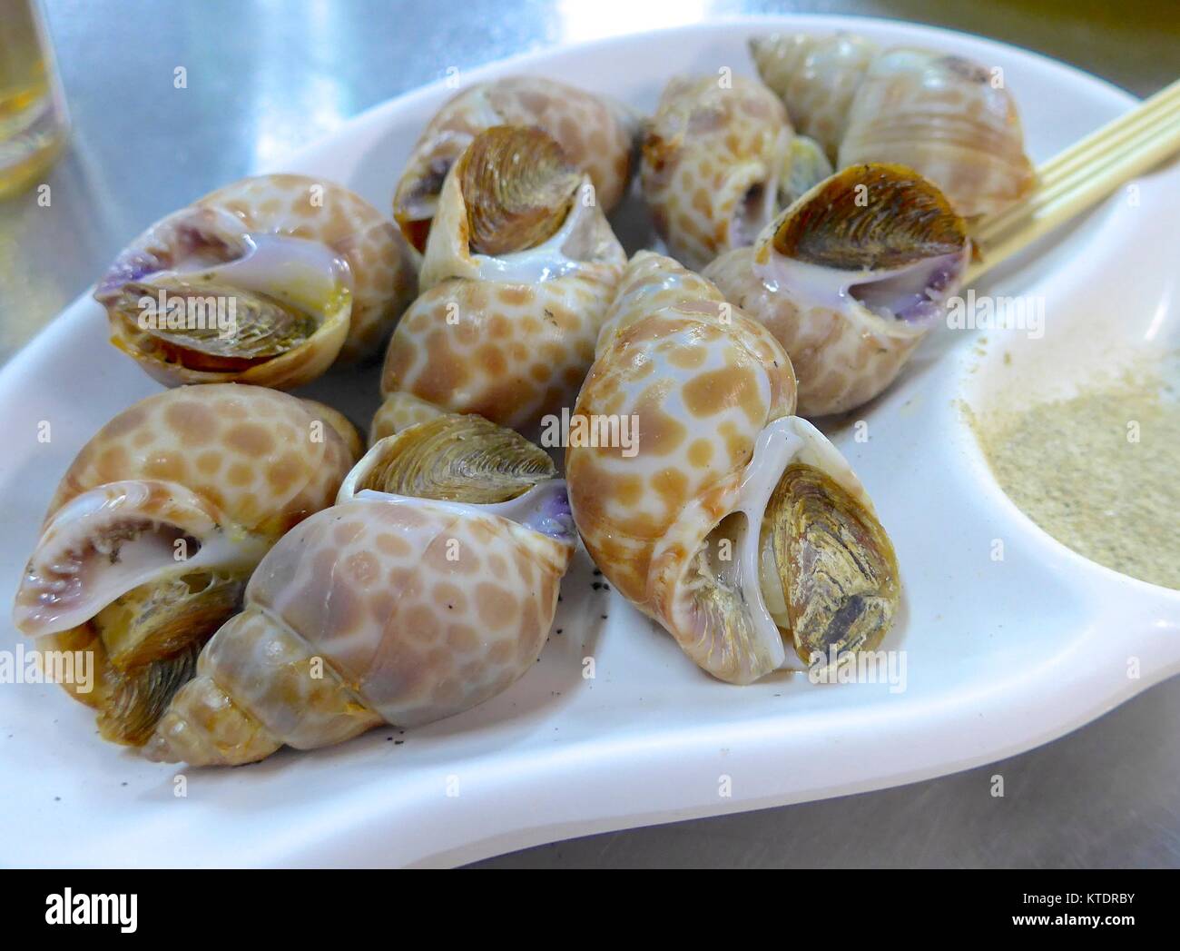 Fried conch close up on plate Stock Photo - Alamy