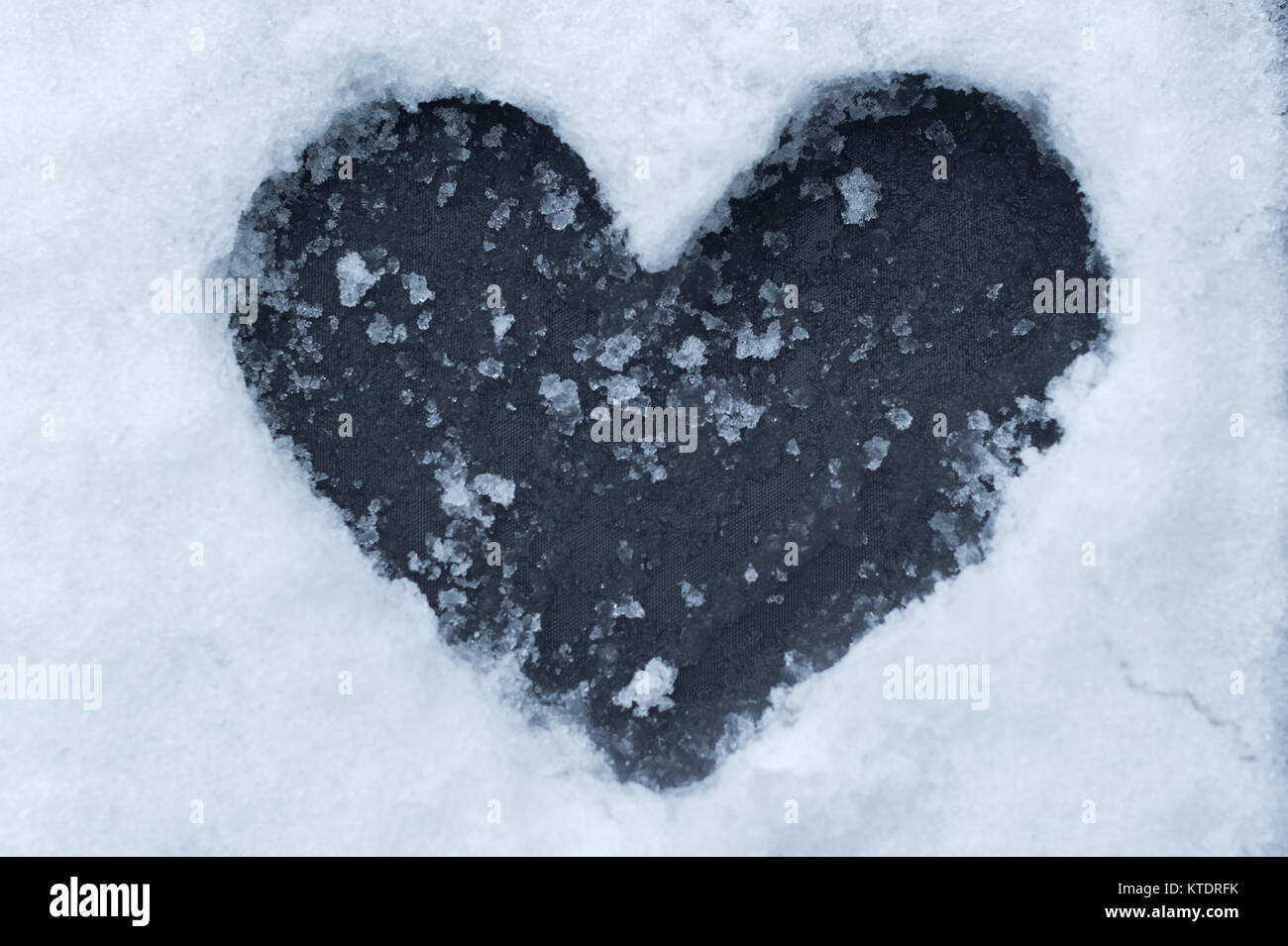 Ice snow heart hi-res stock photography and images - Alamy