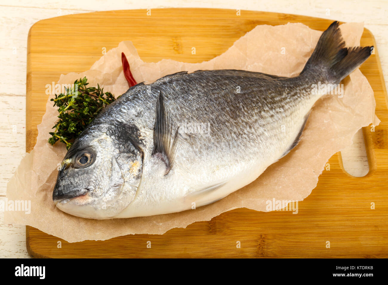raw dorada fish - ready for cooking Stock Photo - Alamy