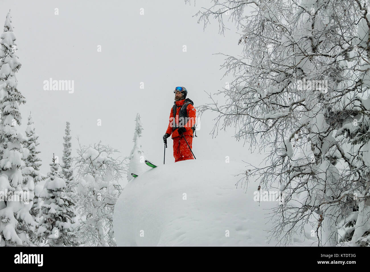 Man standing at top of ridge. Ski touring in mountains. Adventure ...