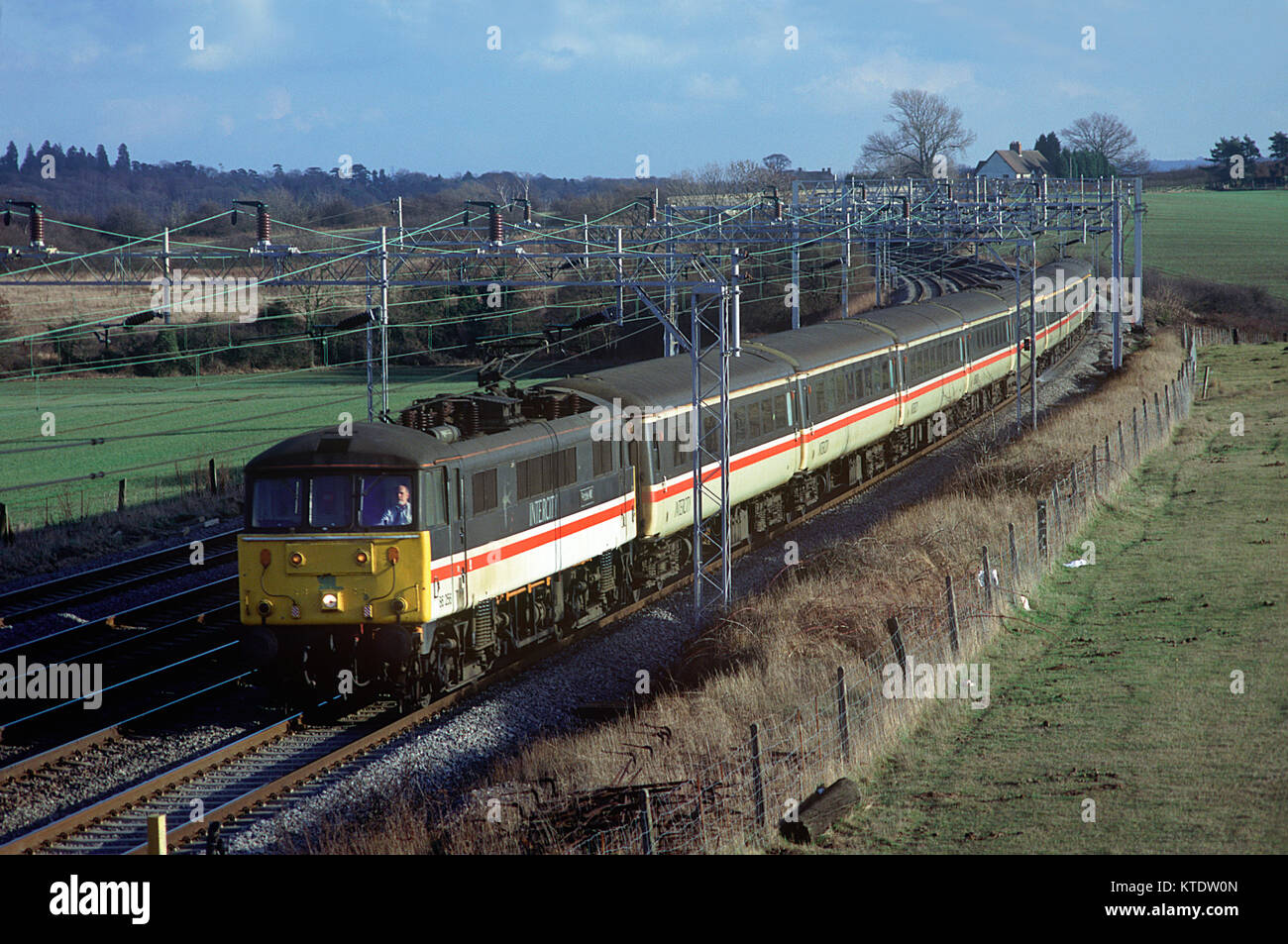 Class 86 electric locomotive number 86256 with a matching rake of ...