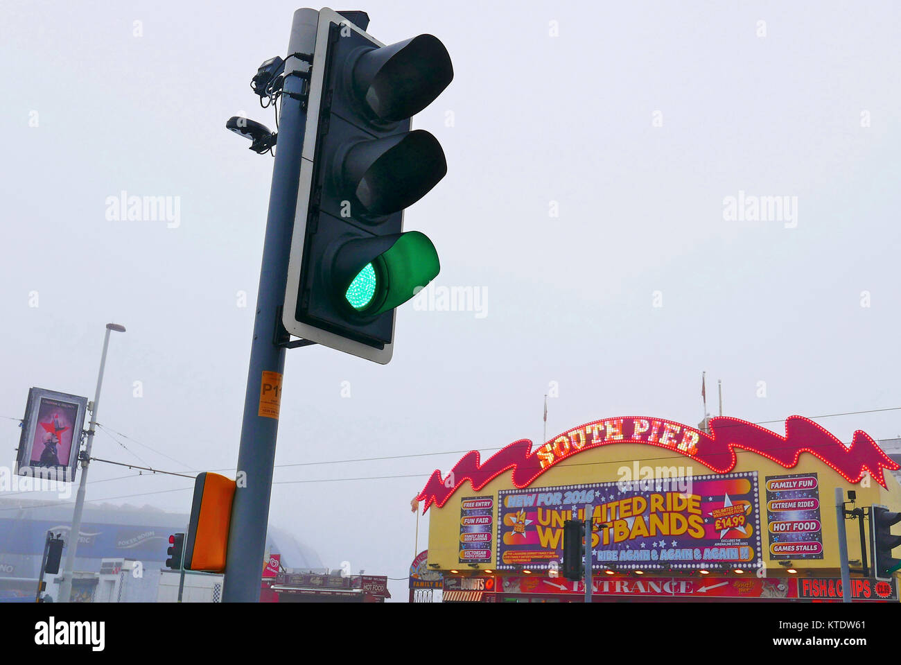 Traffic signals and South Pier in the fog,Blackpool Stock Photo - Alamy