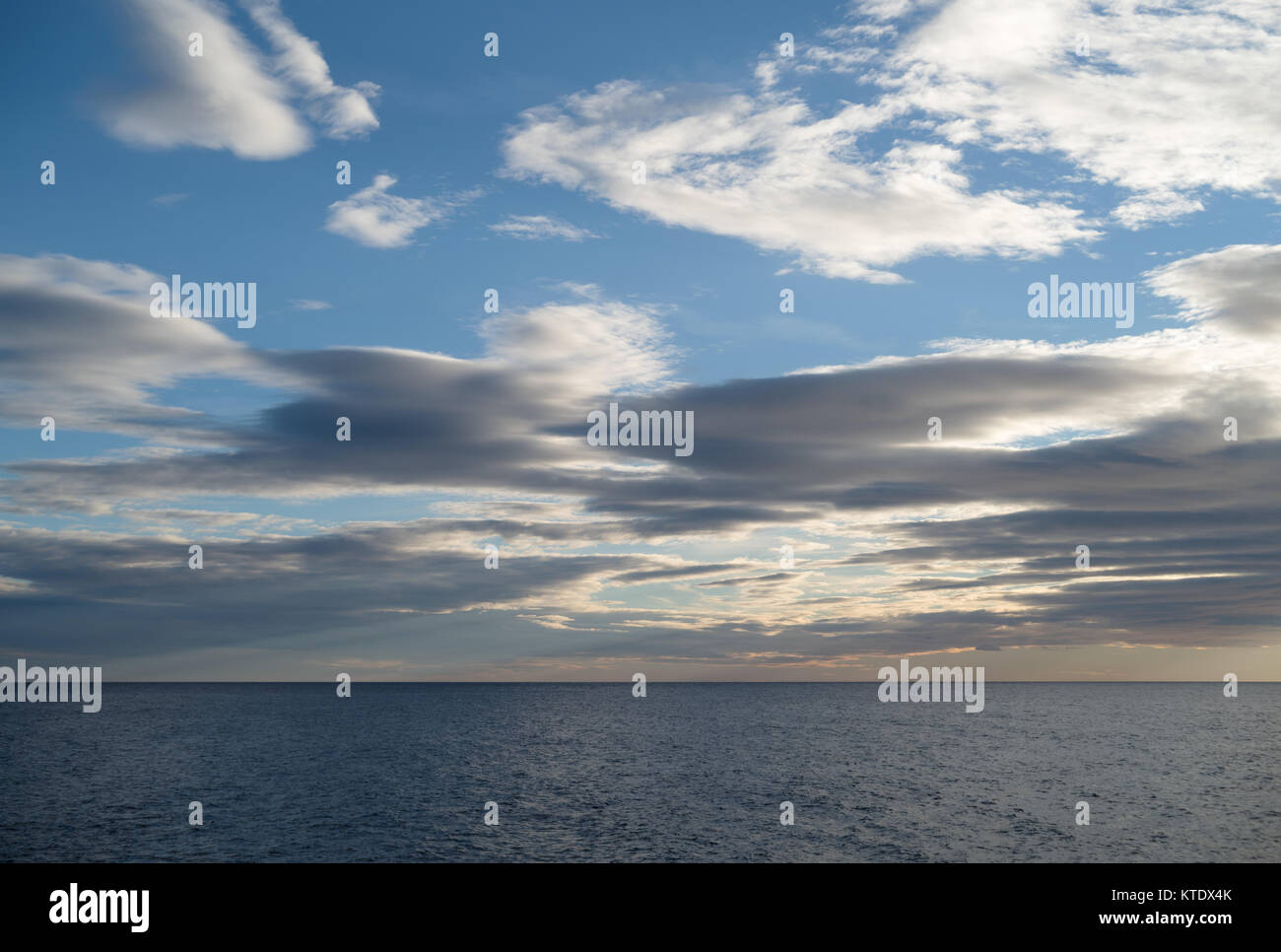 Dark cumulus clouds hovering over the sea Stock Photo - Alamy