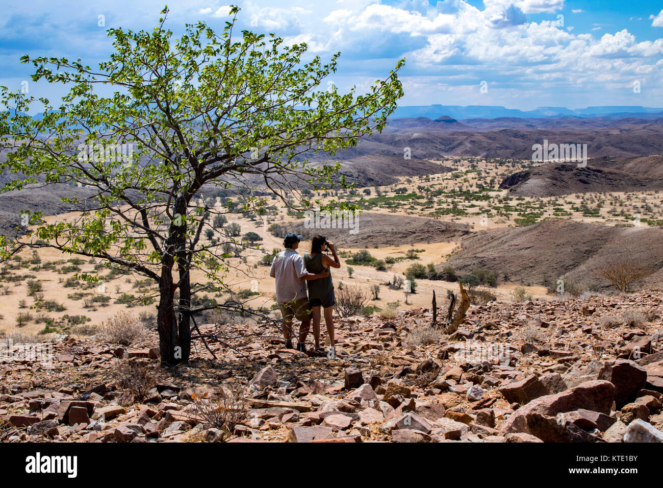 Couple overlooking Huab River in Damaraland - Huab Under Canvas ...