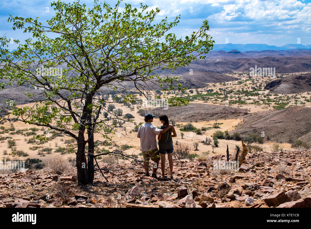 Couple overlooking Huab River in Damaraland - Huab Under Canvas ...