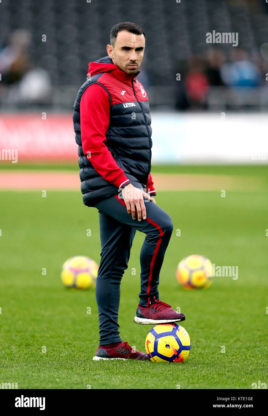 Leon Britton oversees the Swansea teams pre-match warm up before the ...