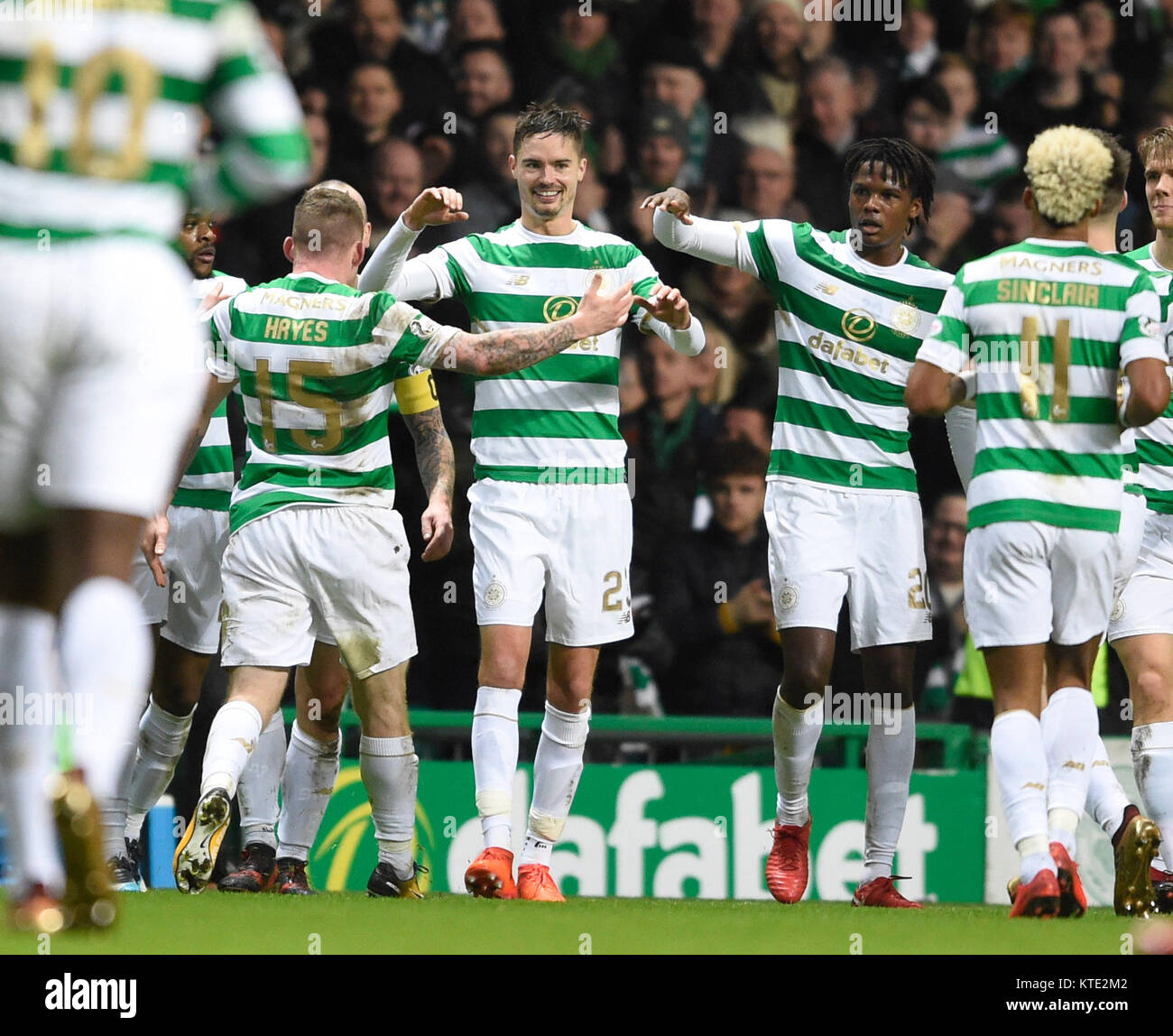 Celtic's Michael Lustig (centre) celebrates with his team-mates ...