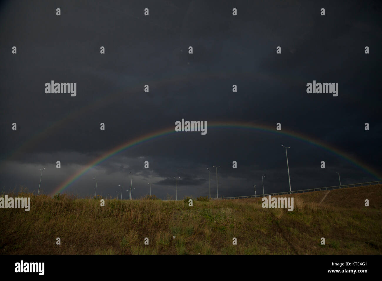 Beautiful rainbow stormy skies over hi-res stock photography and images ...