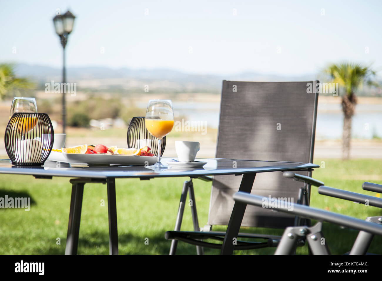 outside breakfast with fruit salad and orange juice Stock Photo - Alamy