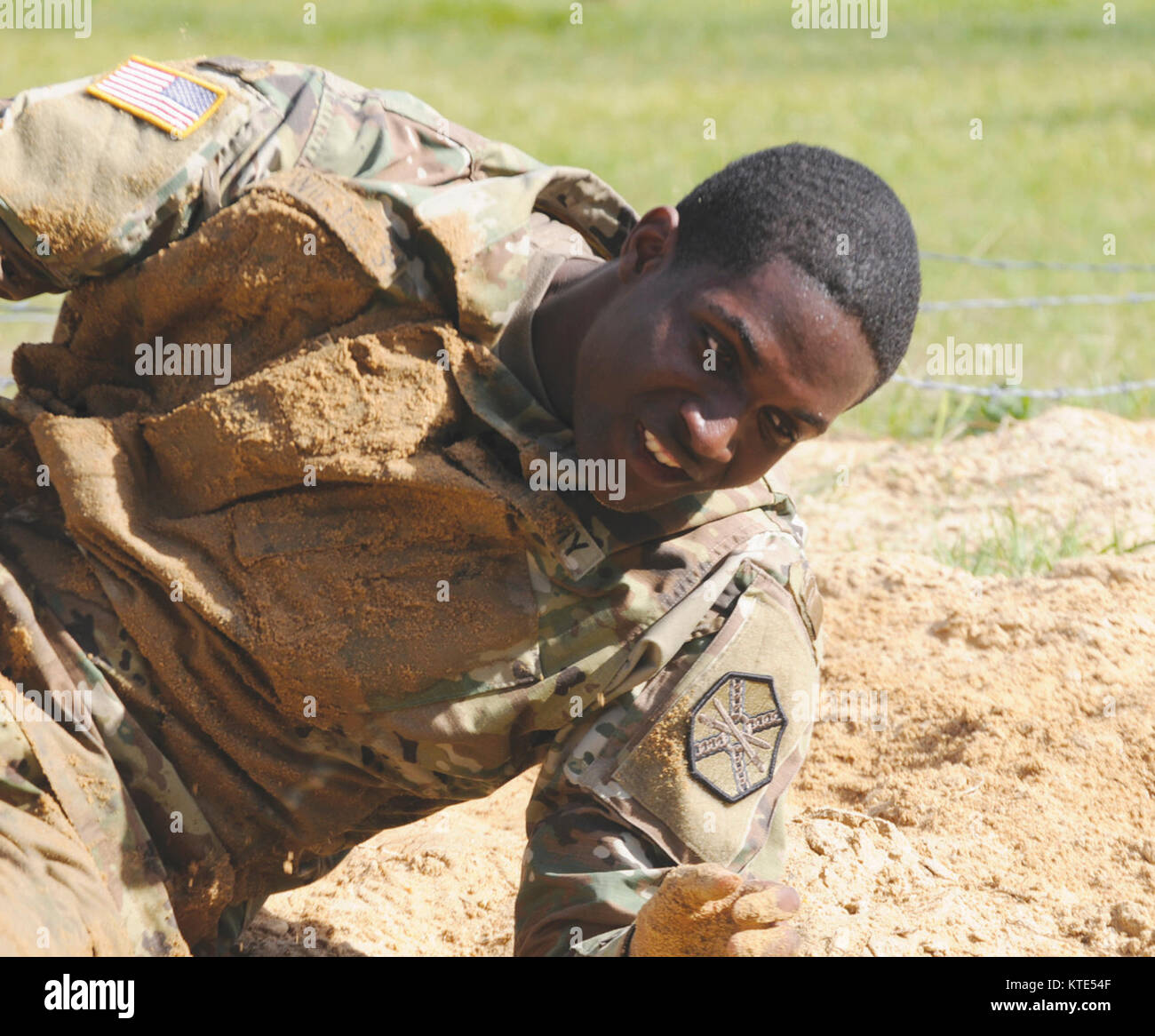 Though his uniform is caked in mud and sand, this Soldier continues to ...