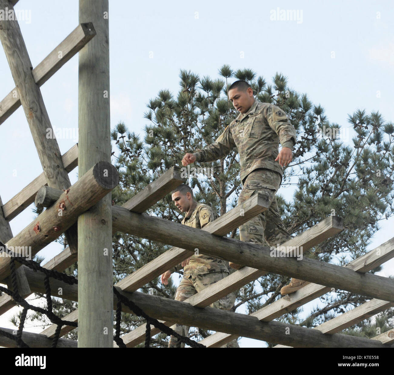 These Soldiers are making their way across the first of nine obstacles ...