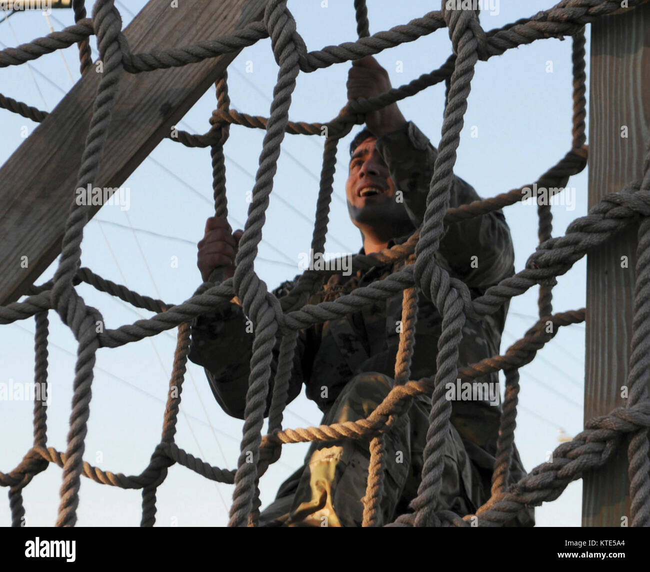 Sgt. Maiwand Arends, 3rd Battalion, 353rd Infantry Regiment, climbs ...