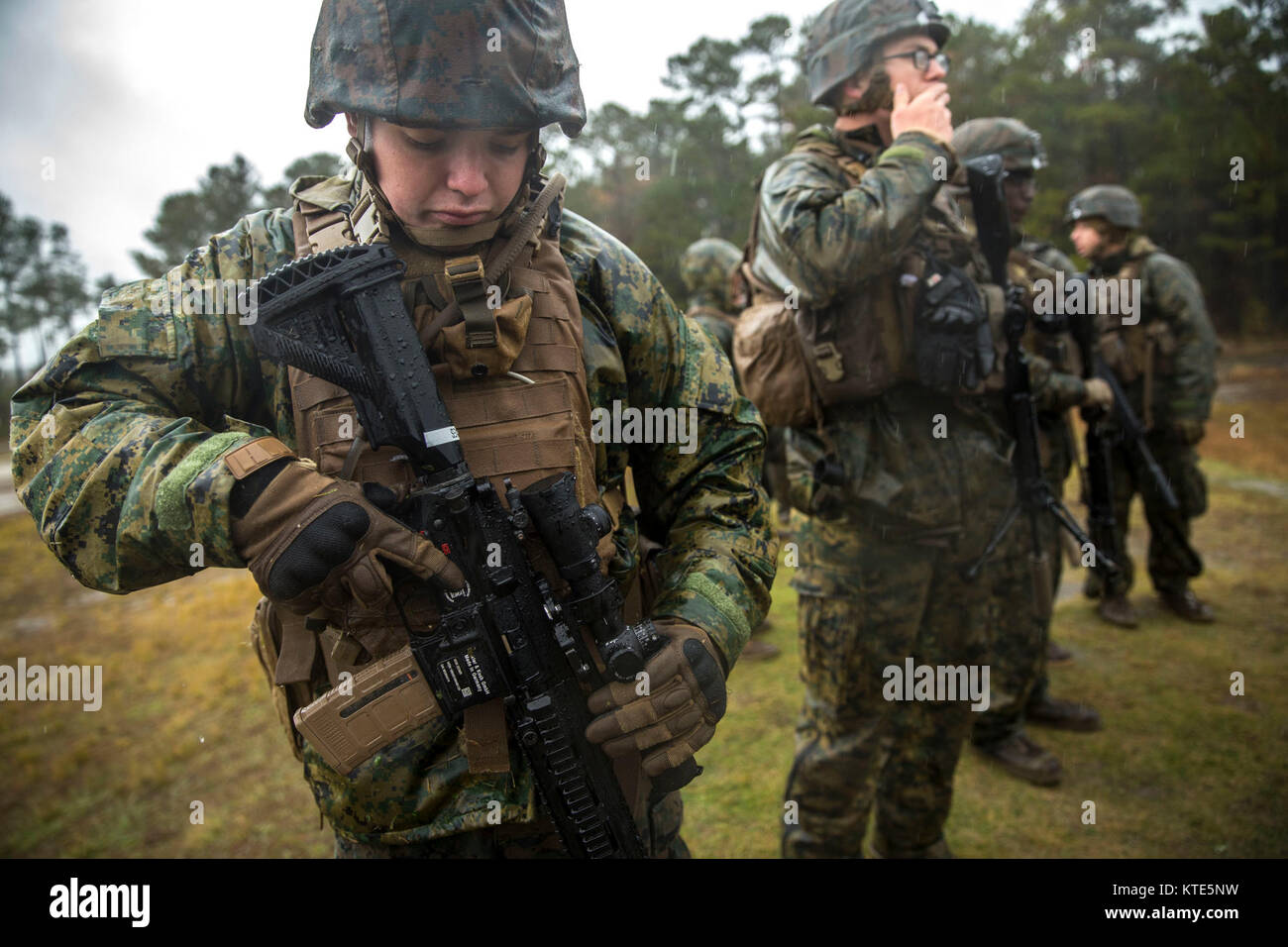 U.S. Marines with 3rd Battalion 8th Marine Regiment fire the M38 Squad ...