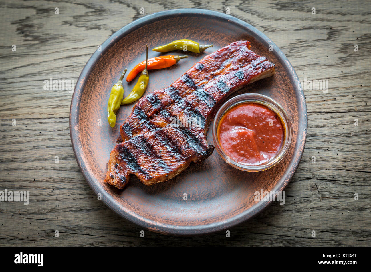 Portion of grilled pork ribs Stock Photo - Alamy