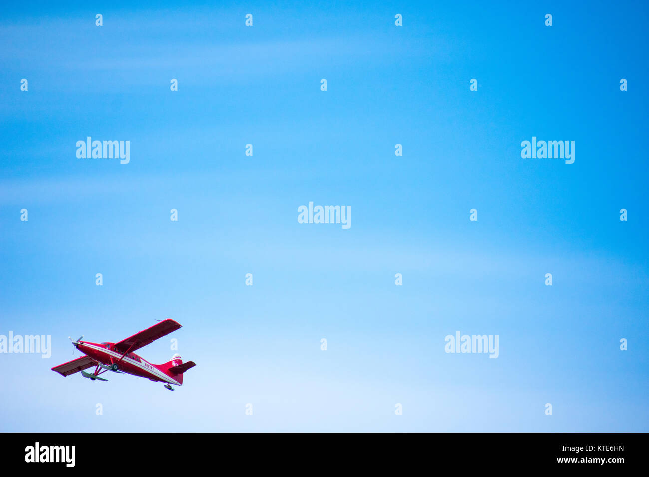 White plane with blue tail hi-res stock photography and images - Alamy
