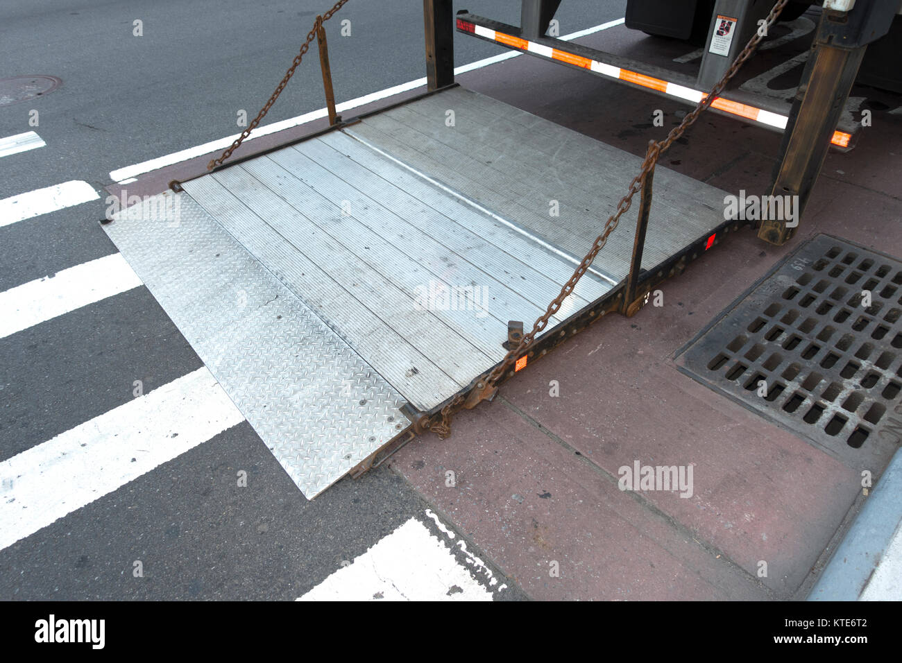back of shipping truck elevator tailgate lift Stock Photo - Alamy