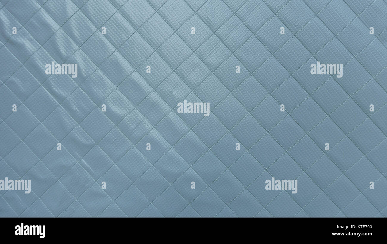 diamond quilted hanging teal tarp Stock Photo - Alamy