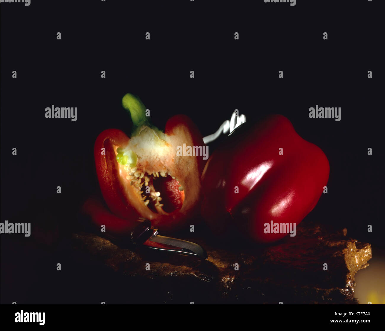 Red sweet pepper still-life and knife Stock Photo - Alamy