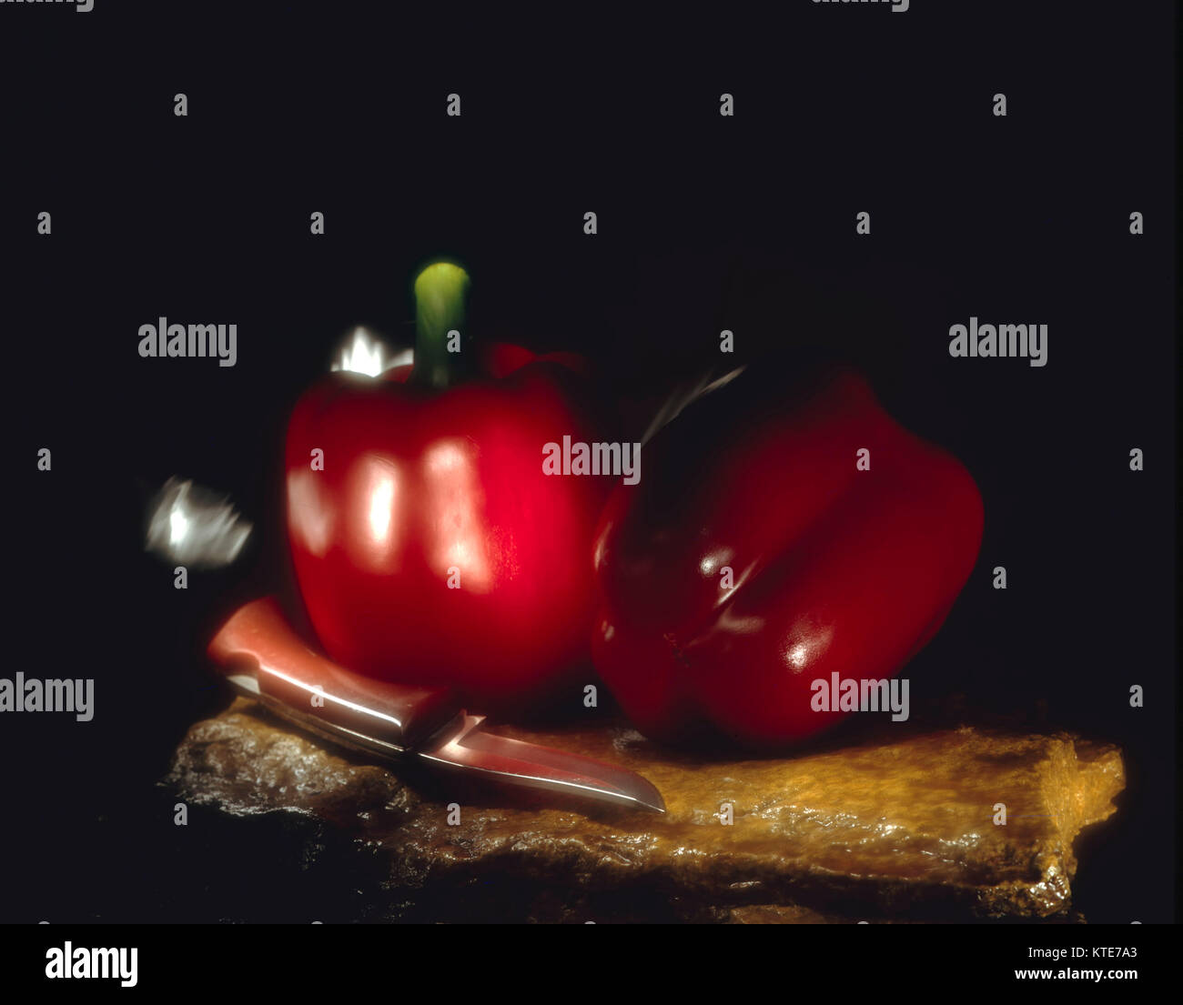 Red sweet pepper still-life and knife Stock Photo - Alamy