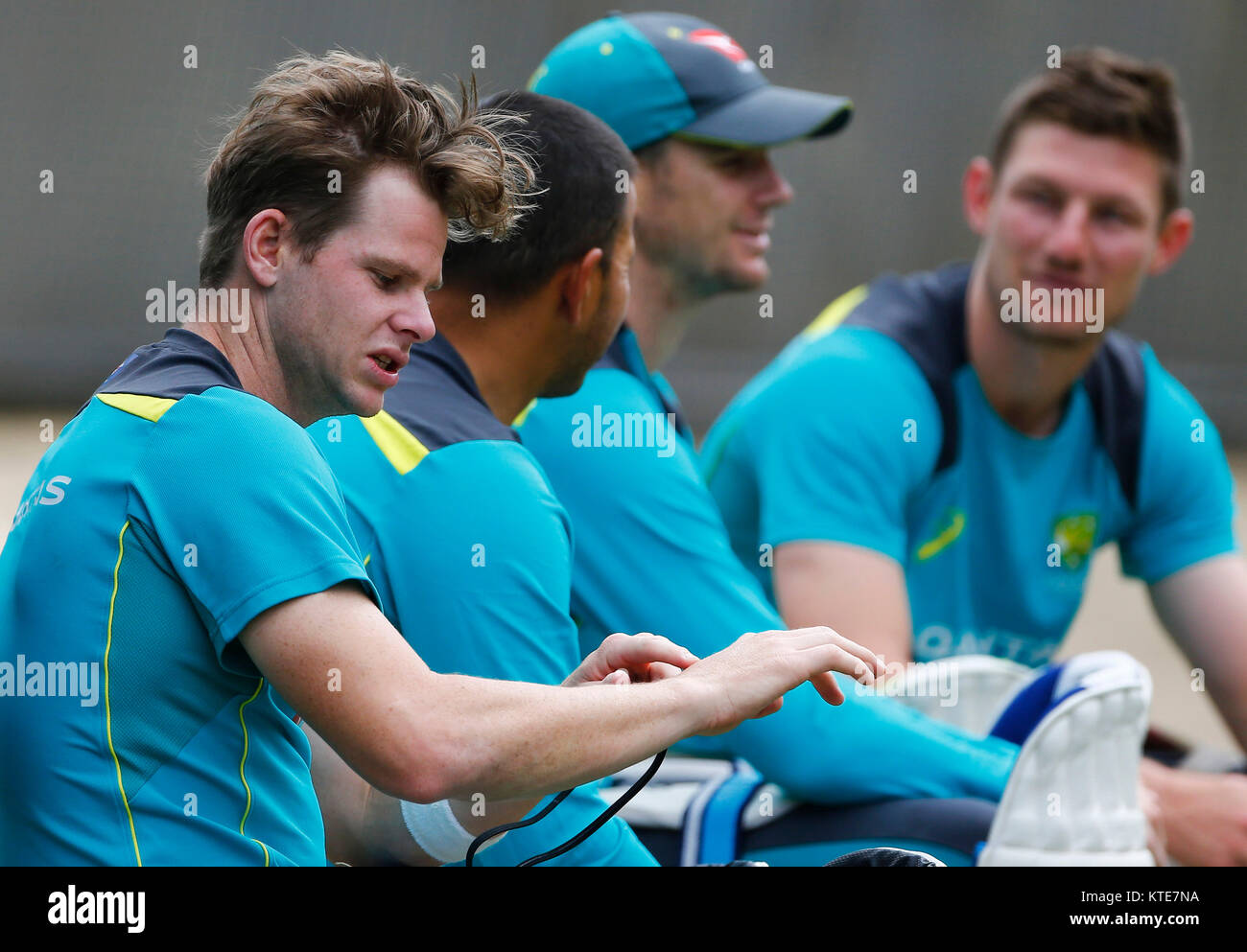Australia's Steve Smith reacts after being hit on the hand during a ...