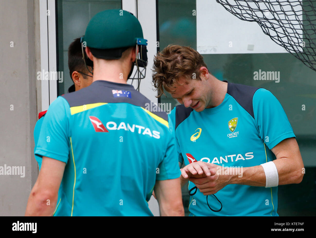 Australia's Steve Smith reacts after being hit on the hand during a ...