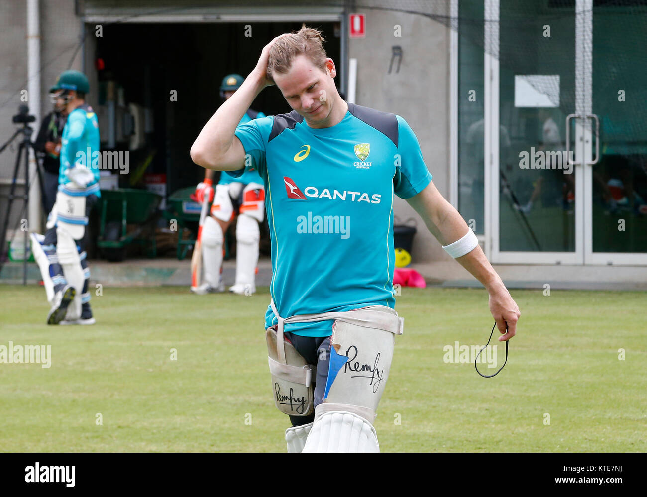 Australia's Steve Smith reacts after being hit on the hand during a ...