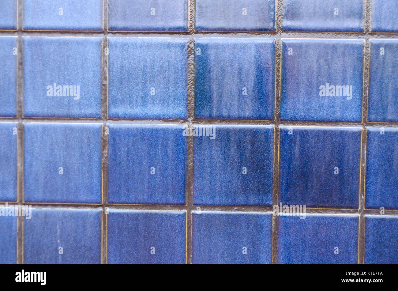 Background of blue square tiles on the wall and pool of the pool ...
