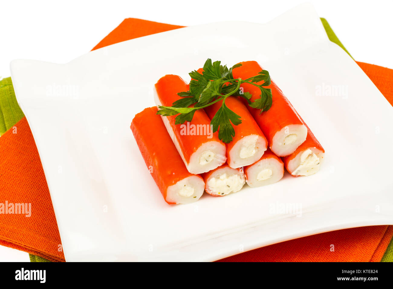 Surimi crab sticks on white plate. Studio Photo Stock Photo - Alamy