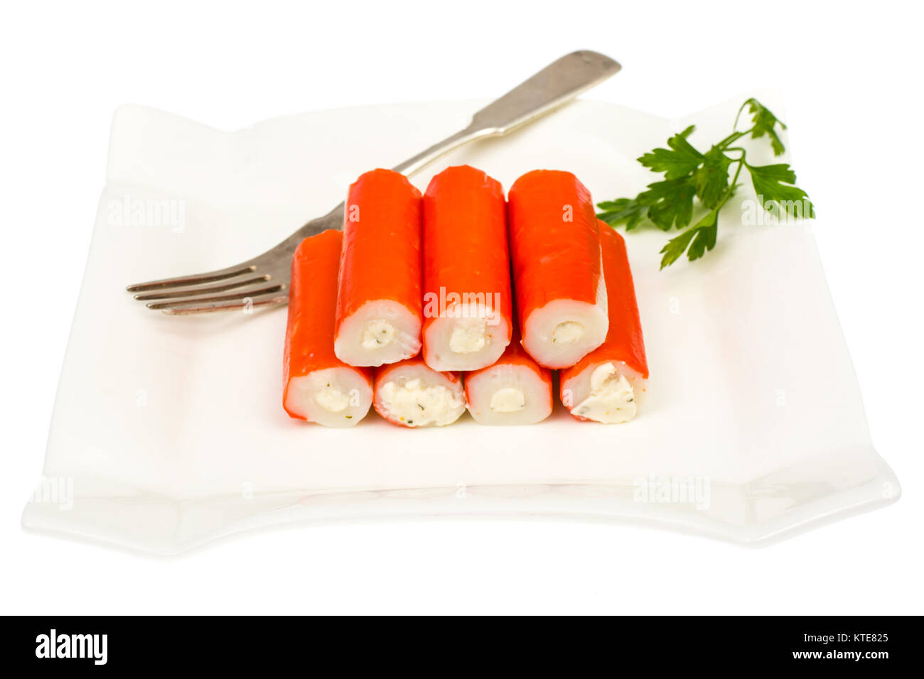 Surimi crab sticks on white plate. Studio Photo Stock Photo - Alamy