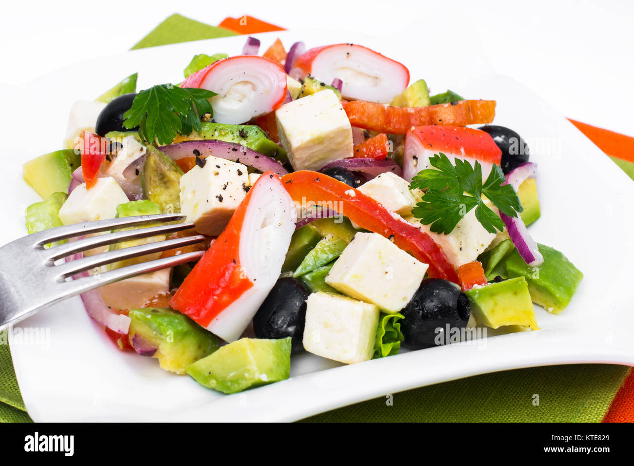 Vegetable salad with avocado, surimi and fetus. Studio Photo Stock ...