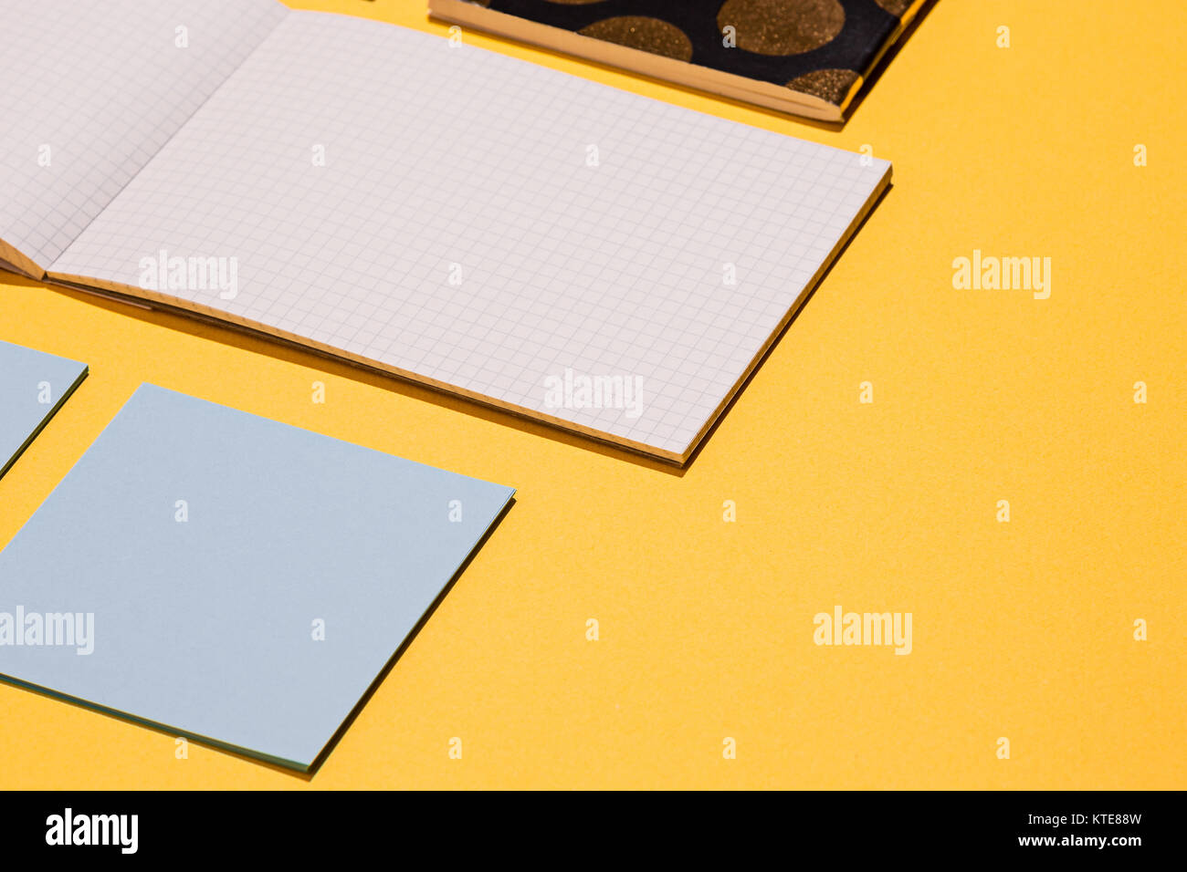 The many notebooks on colored table. memo and planning concept Stock ...