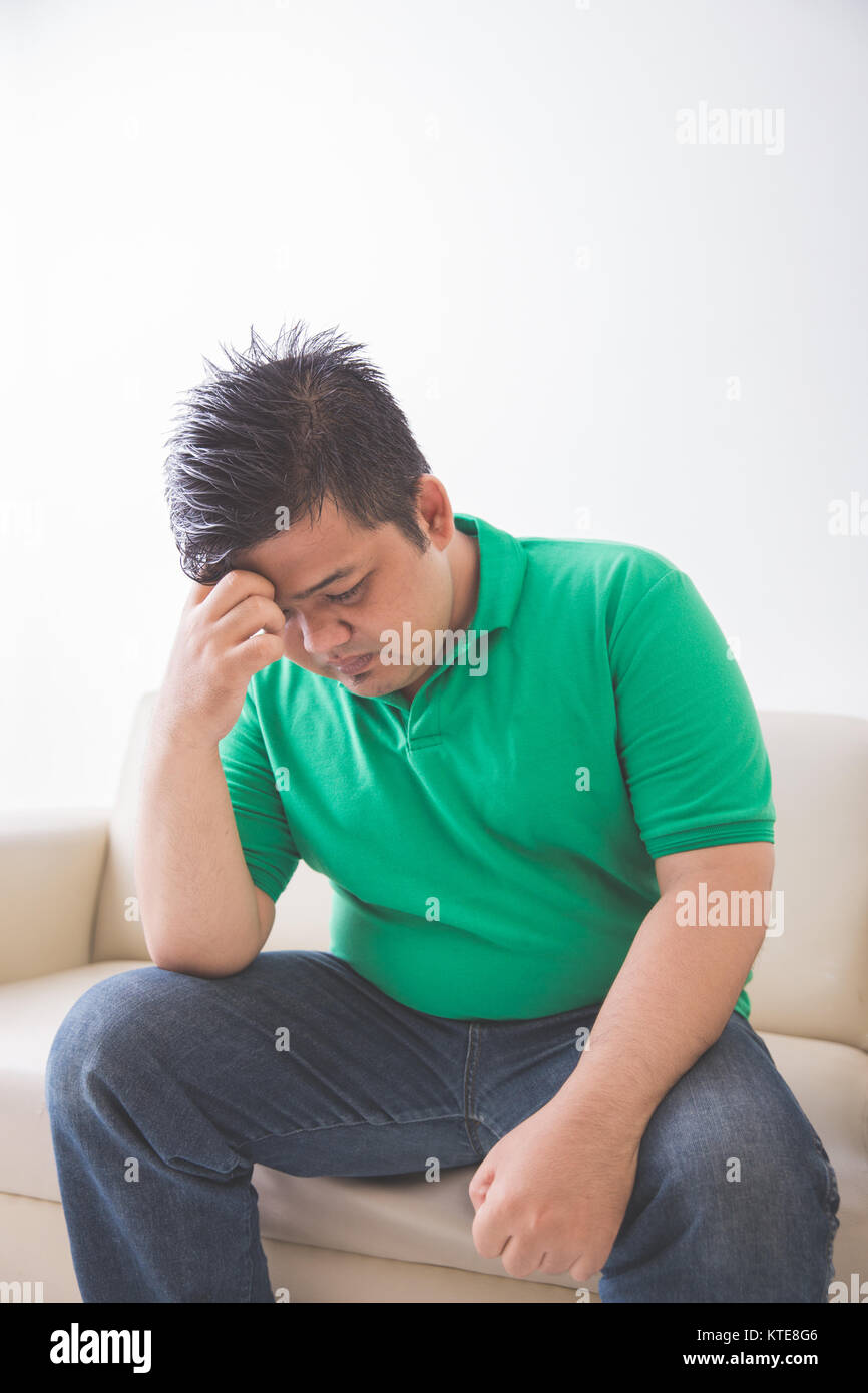 obese man thinking about his weight problem Stock Photo - Alamy