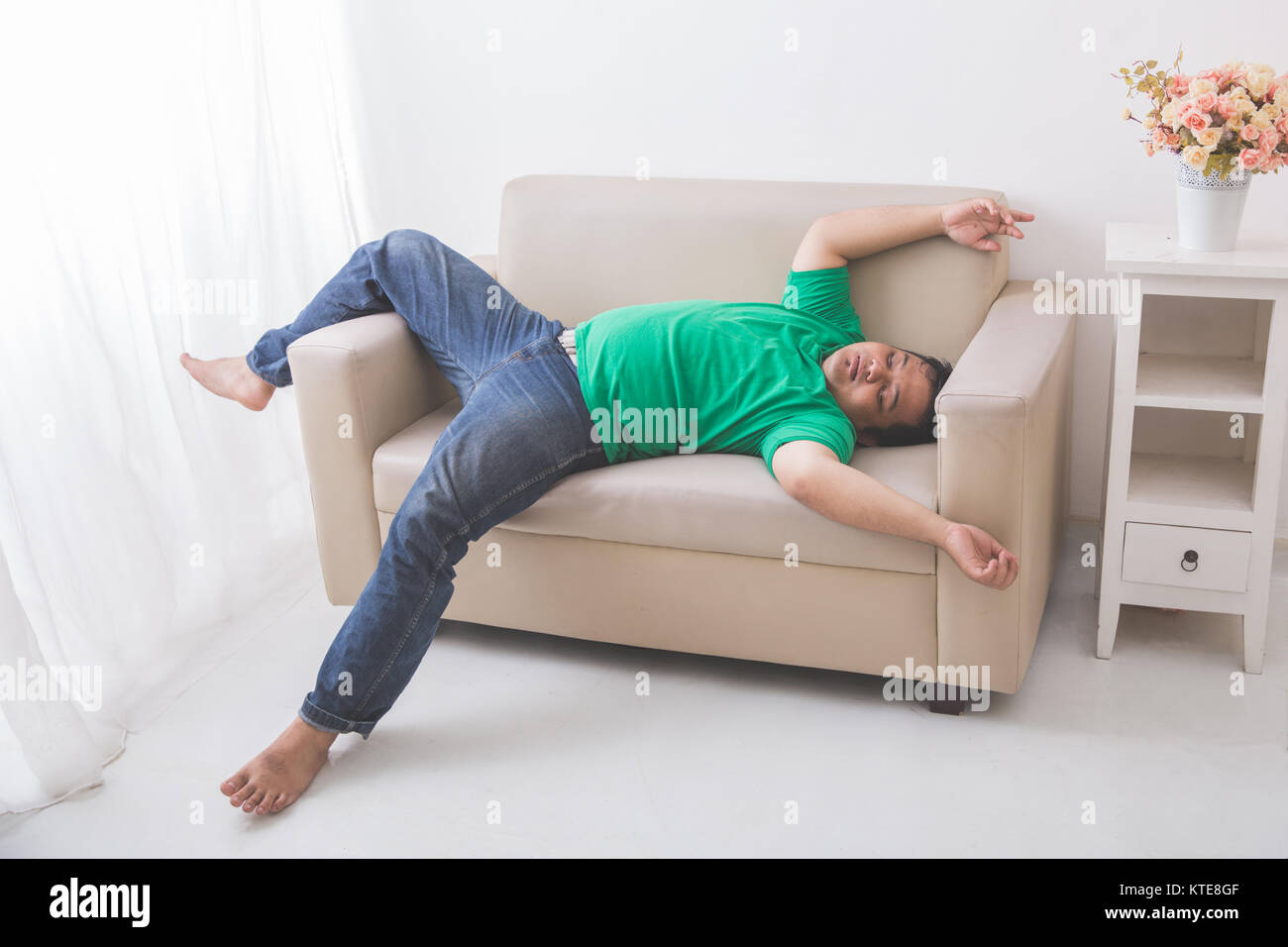 Obese man sleeping hi-res stock photography and images - Alamy