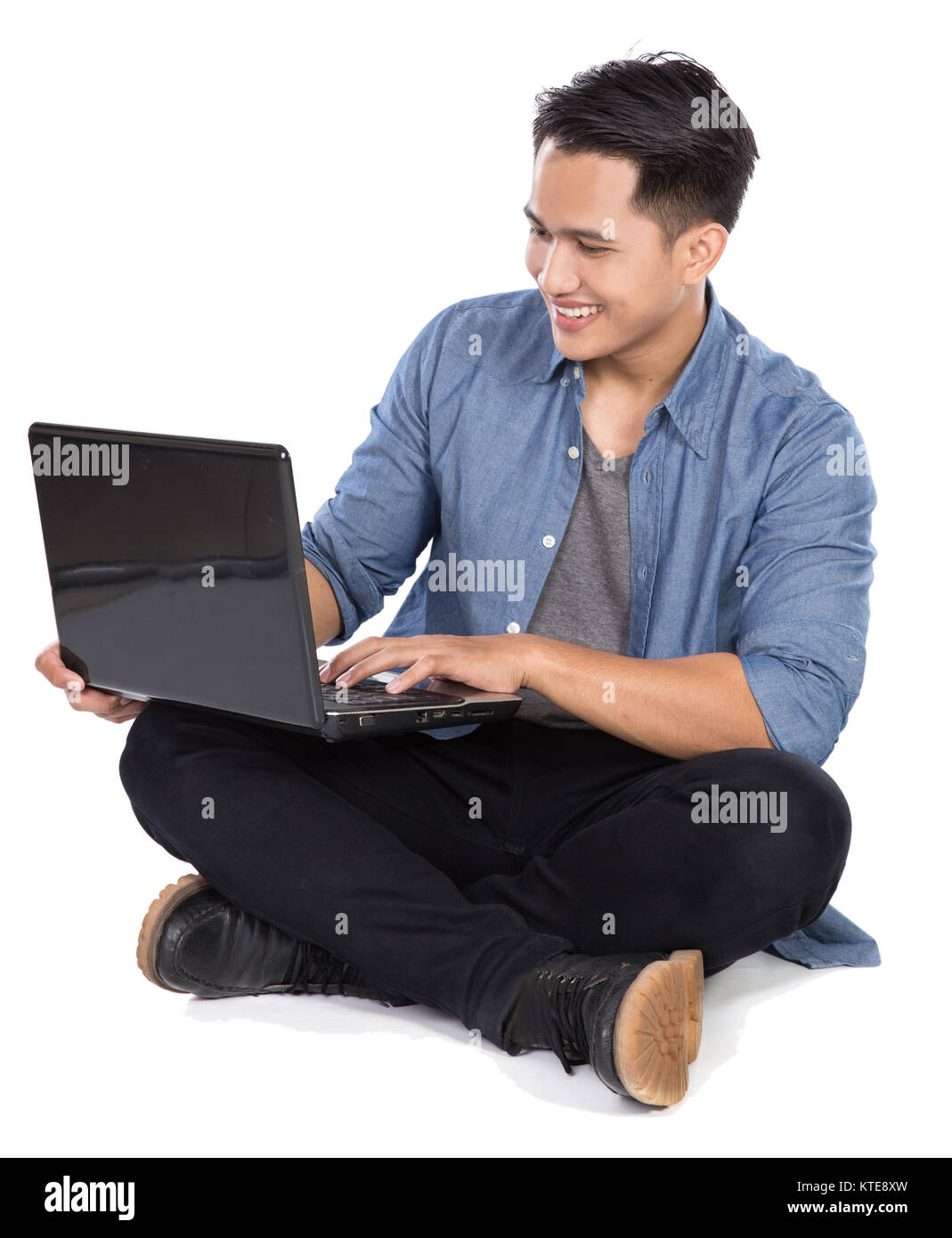 Young asian man using laptop, isolated in white background Stock Photo ...