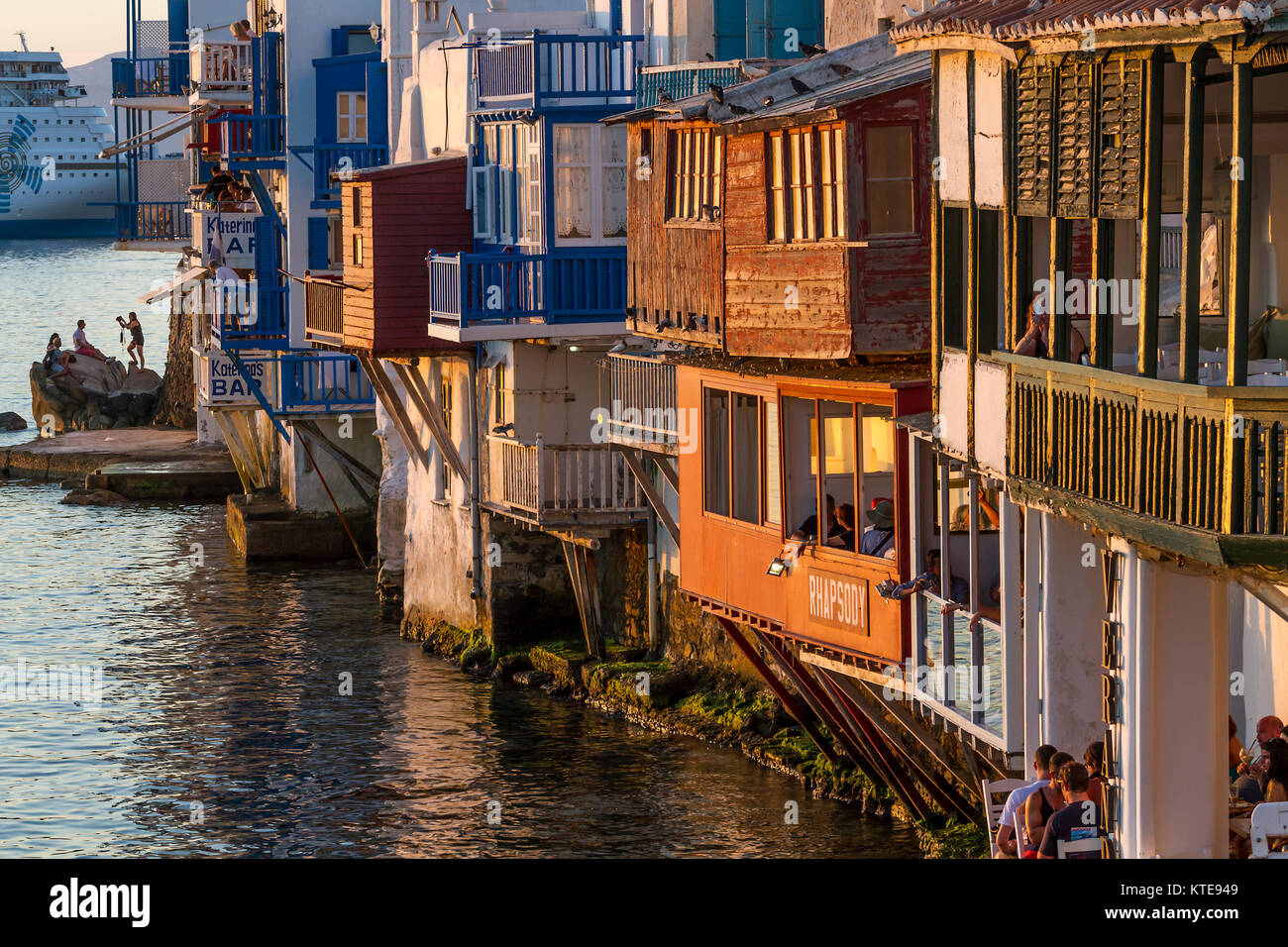 Sunset reflecting off the buildings of Little Venice in Mykonos Town ...