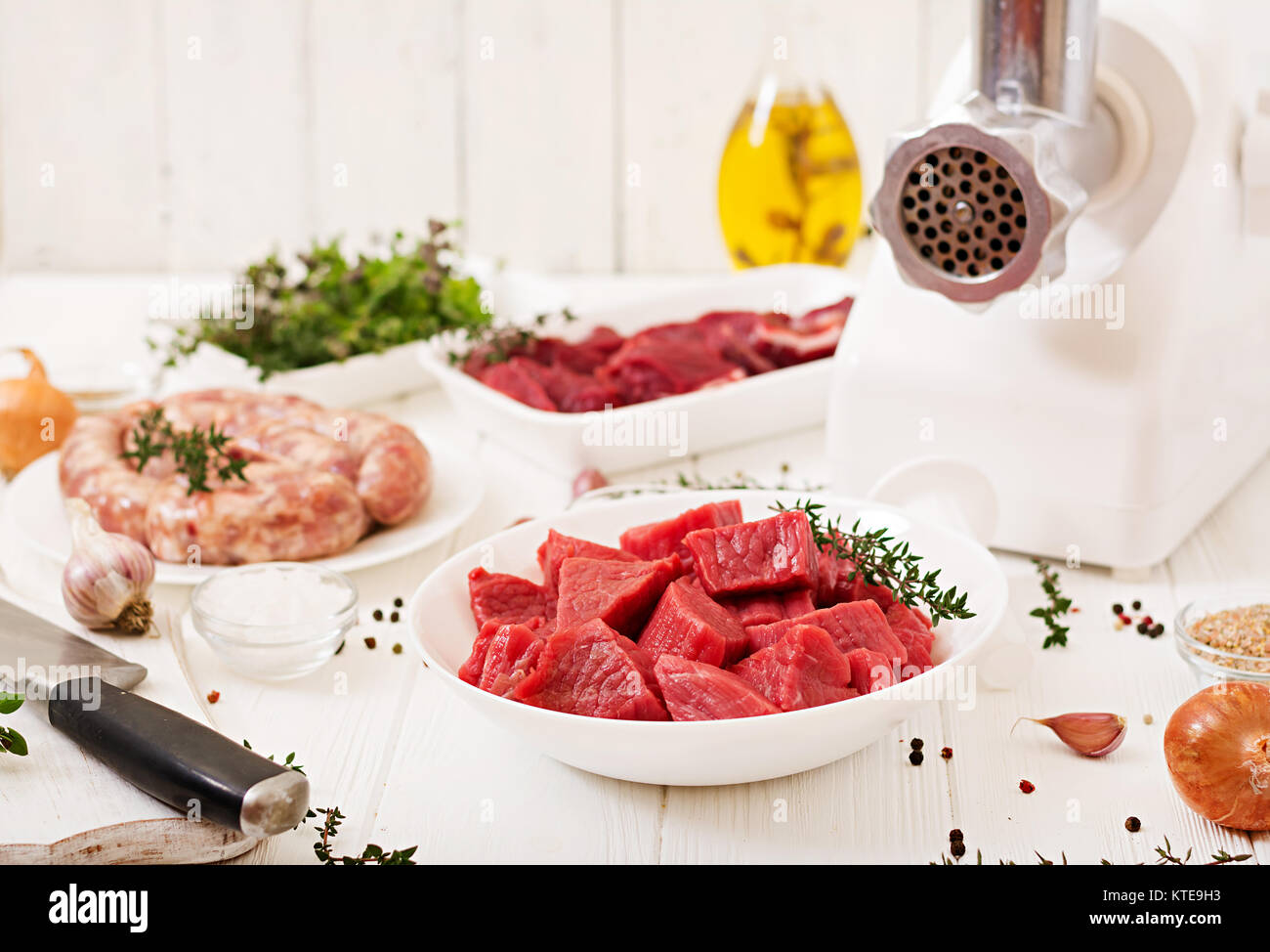 Chopped raw meat. The process of preparing forcemeat by means of a meat ...