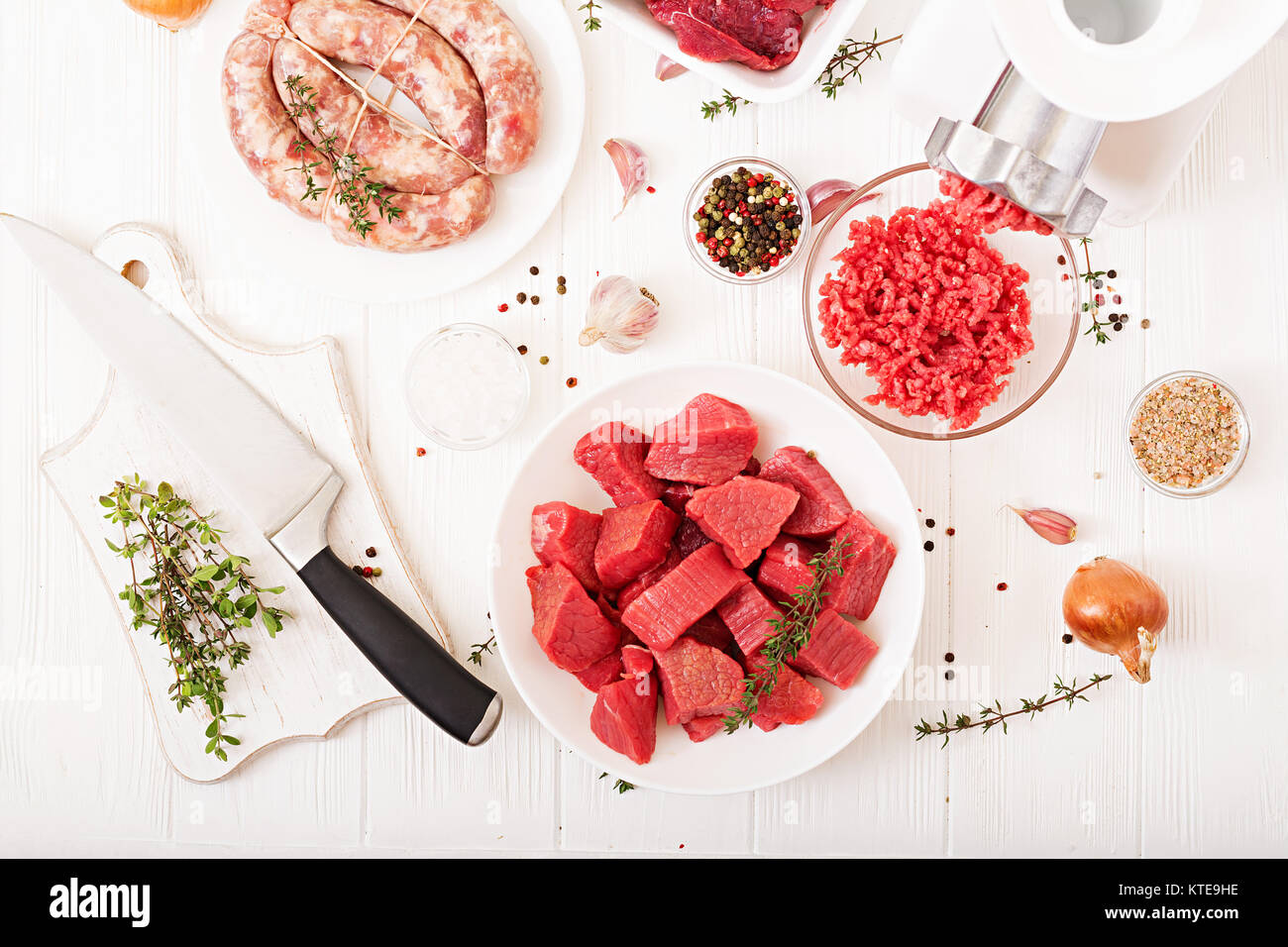 Chopped raw meat. The process of preparing forcemeat by means of a meat ...