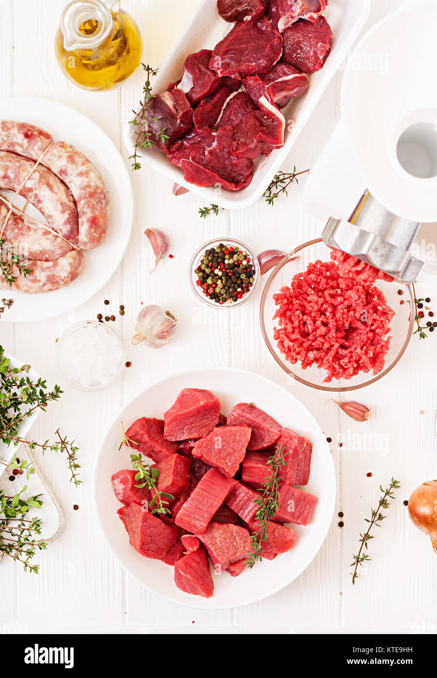 Chopped raw meat. The process of preparing forcemeat by means of a meat ...