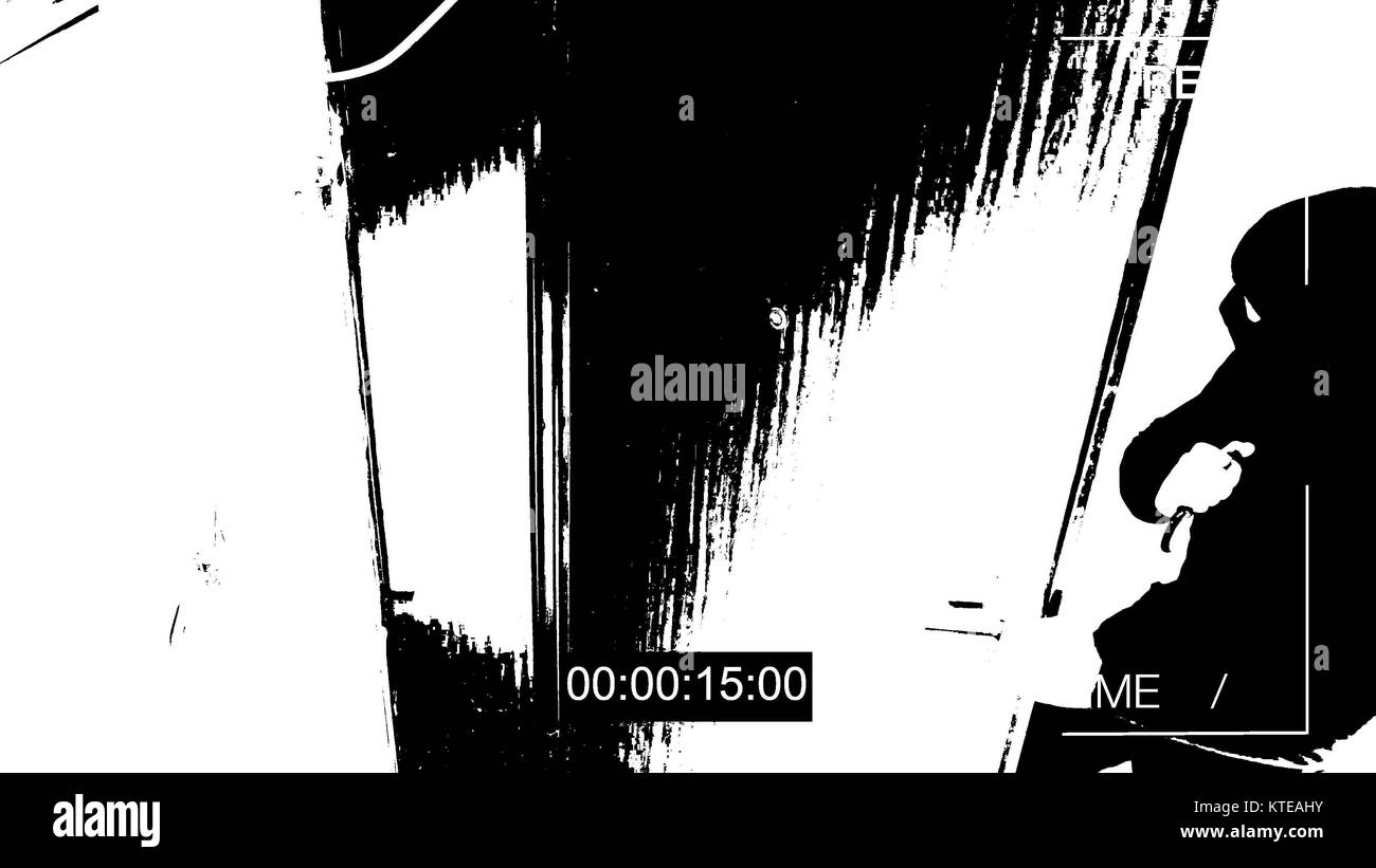 the masked robber c with a knife broke into the apartment. CCTV camera ...