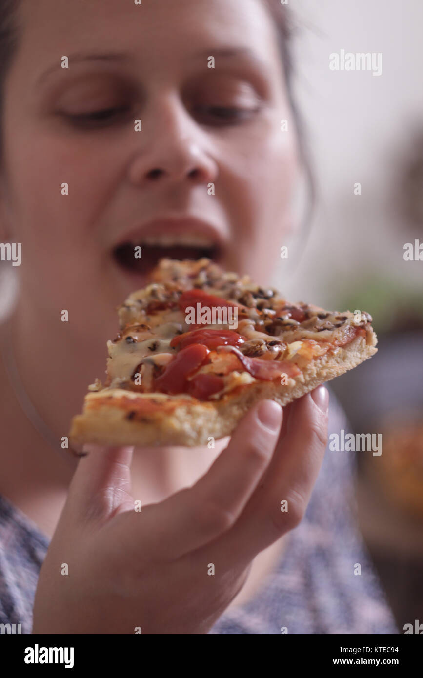 Woman eating pizza italy hi-res stock photography and images - Alamy