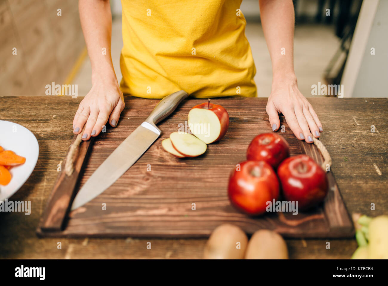 Female person cooking on the kitchen, healthy bio food preparing ...