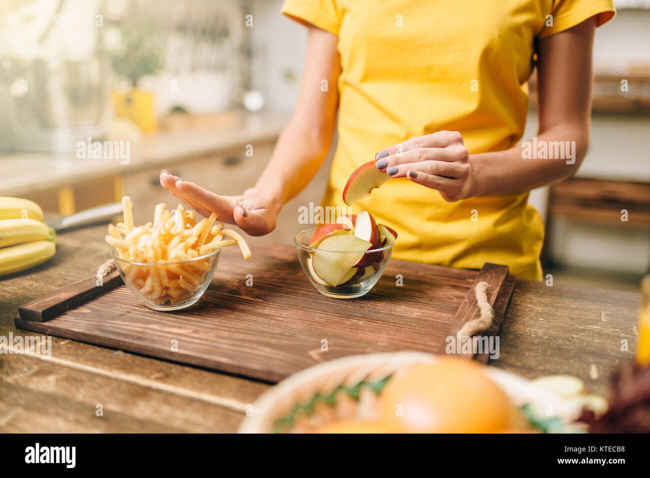 Female person cooking on the kitchen, healthy organic food preparing ...